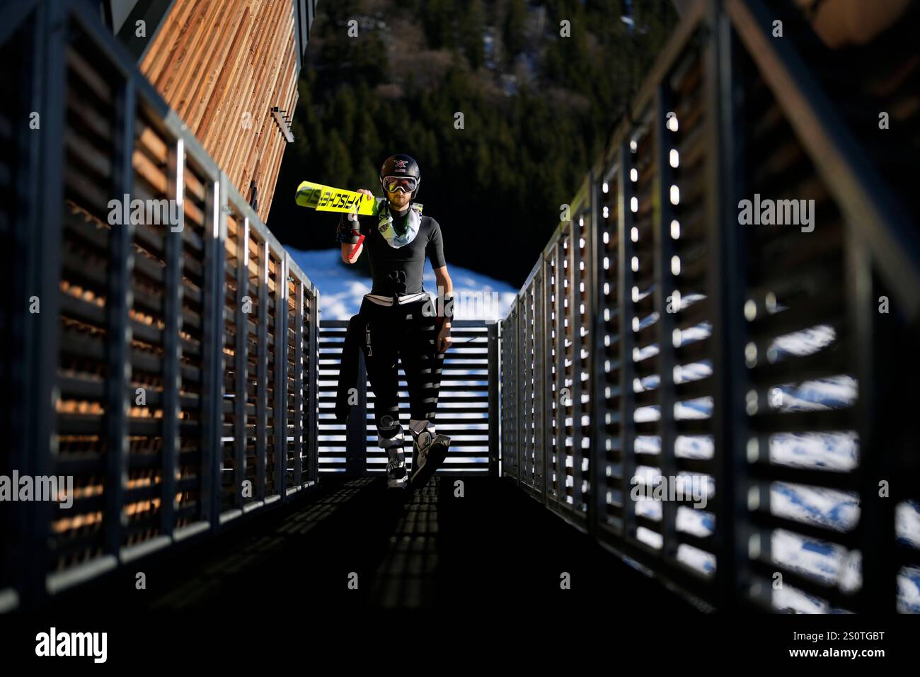 Kevin Bickner, of the United States, arrives up on the ramp for his ...