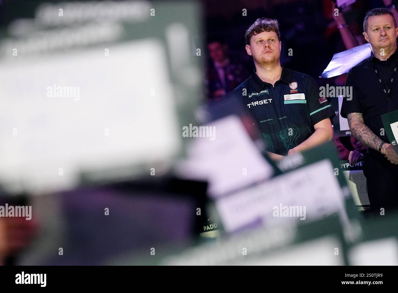 Kevin Doets walks out to play Krzysztof Ratajski (not pictured) in ...