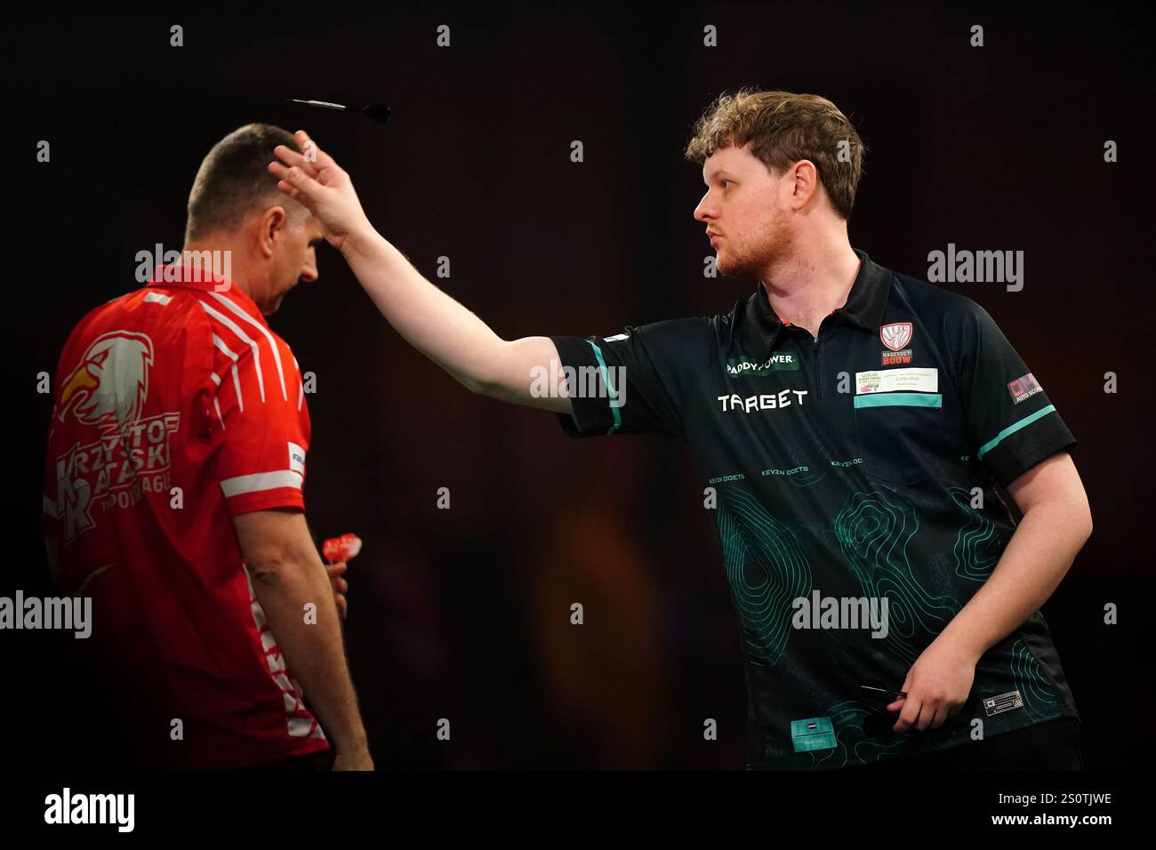 Kevin Doets in action during his third round match against Krzysztof ...