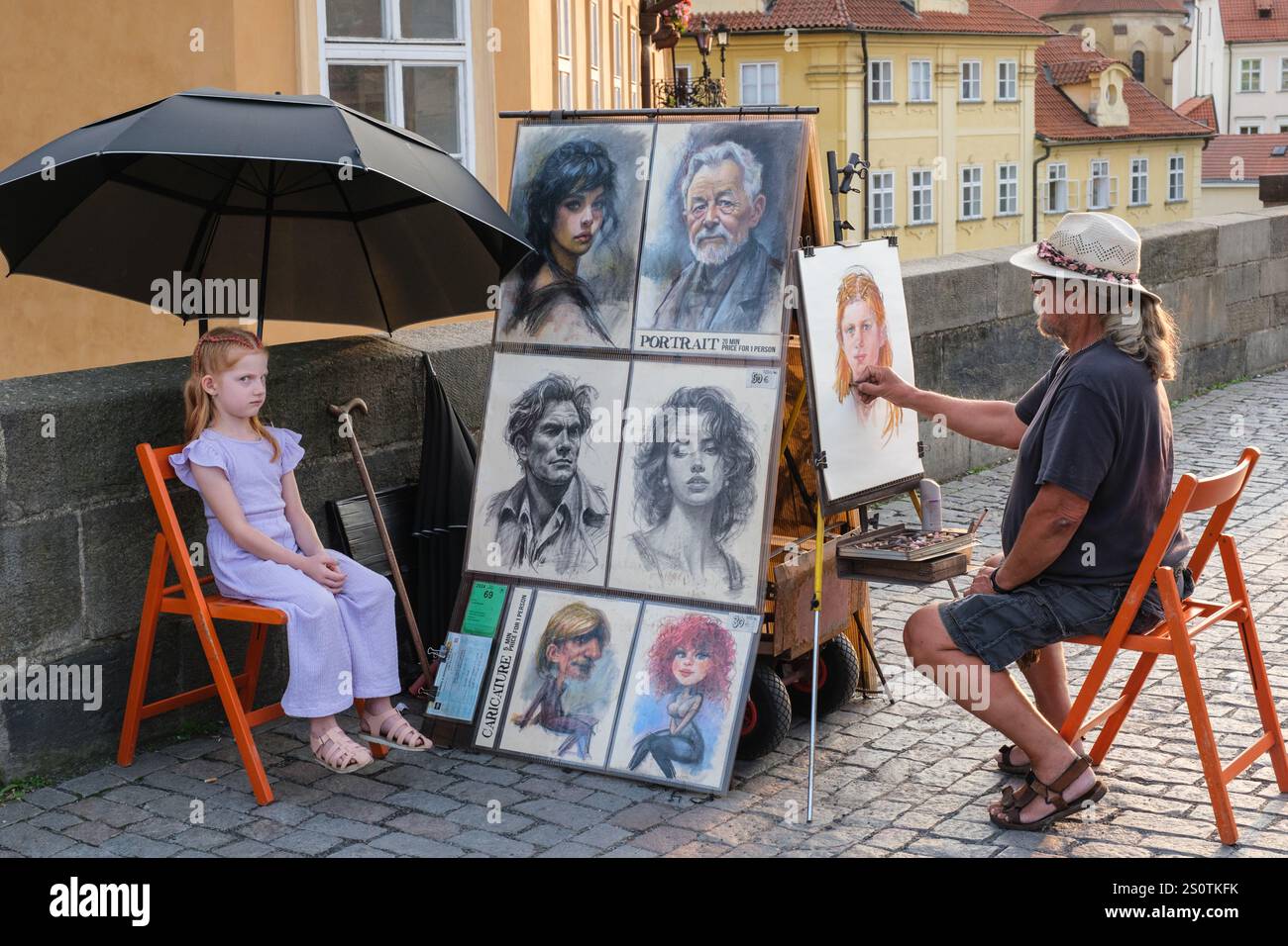 Artist Sketching Young Girl's Portrait on the Charles Bridge, Prague ...
