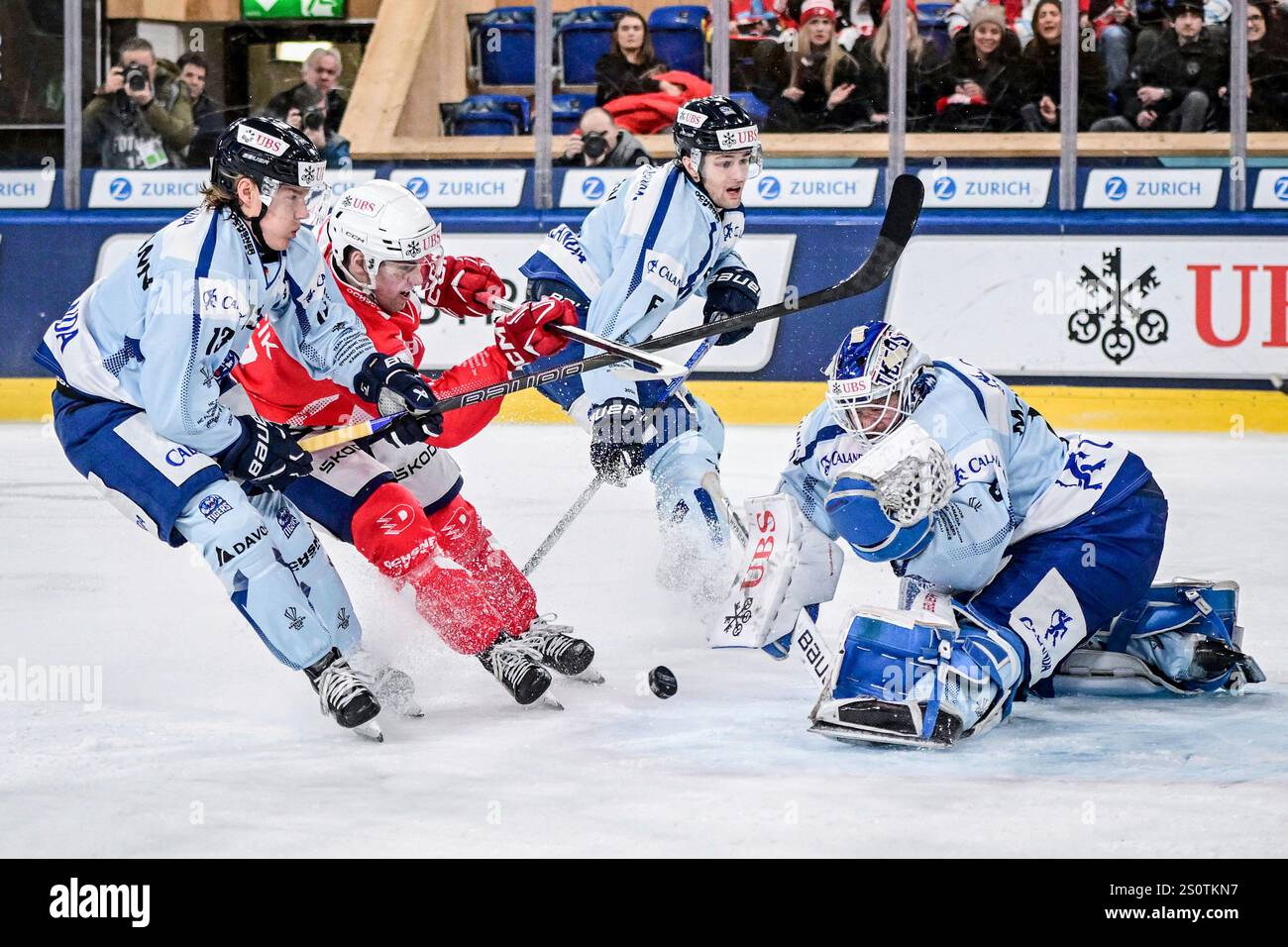 Pardubice's Hercik Daniel, second left, shoots on goal during the 96th ...