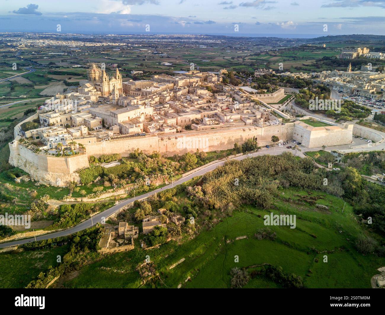 Aerial view of Mdina fortified town in Malta with large ground platform ...