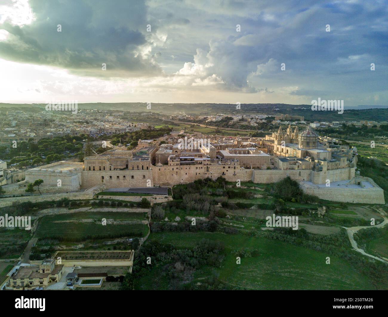 Aerial view of Mdina fortified town in Malta with large ground platform ...