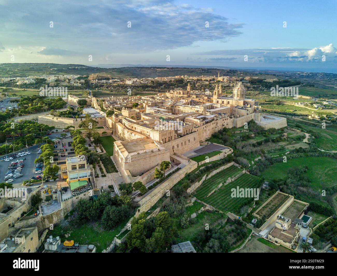 Aerial view of Mdina fortified town in Malta with large ground platform ...