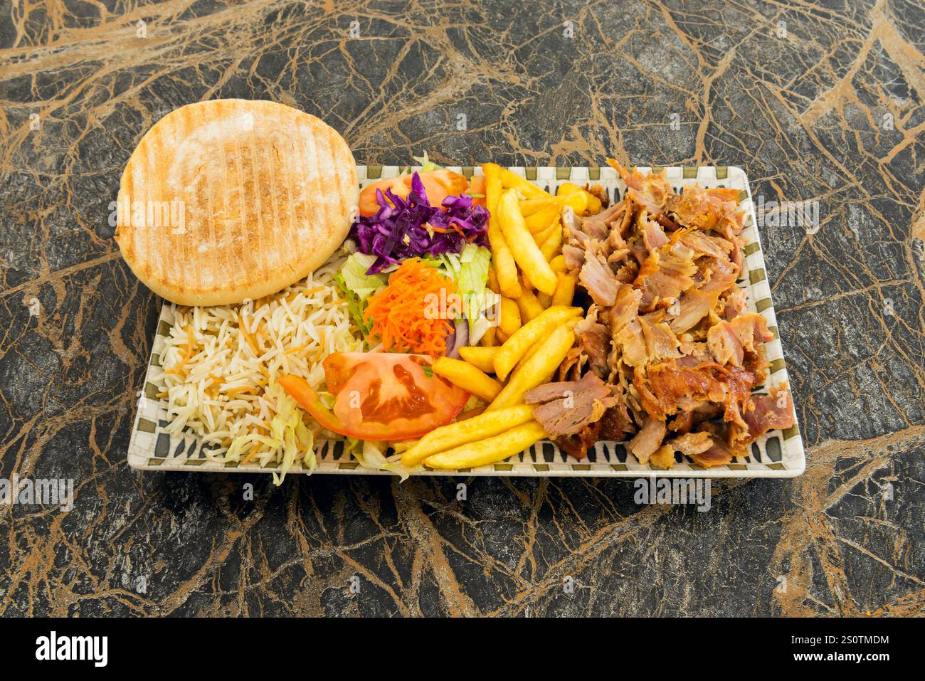 "doner kebab," which is made from marinated meat cooked on a vertical ...