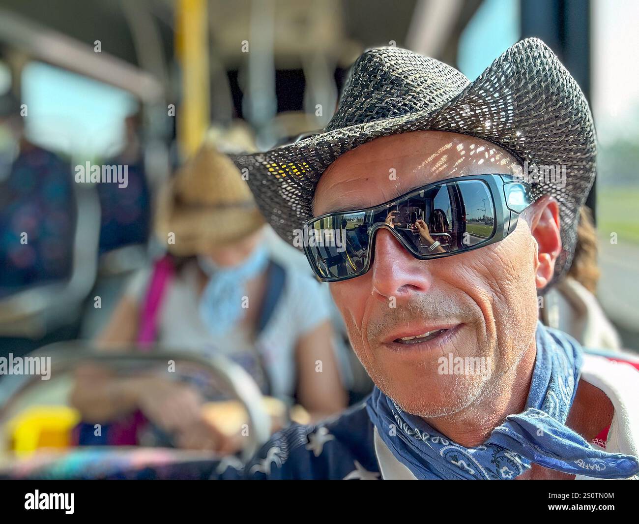 People wearing cowboy hats in hi-res stock photography and images - Alamy