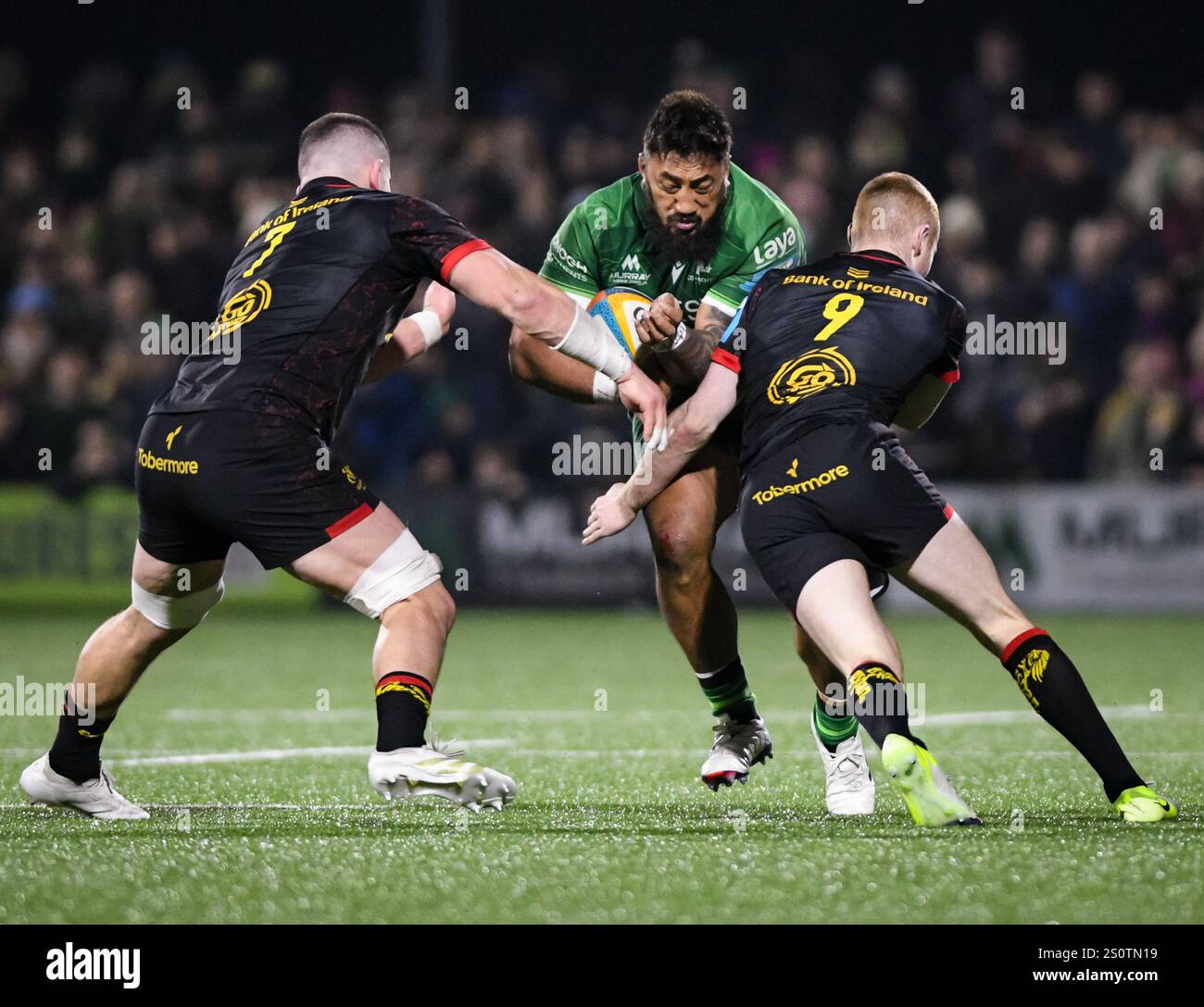 Galway, Ireland. 28th December, 2024. Connacht's Bundee Aki tries to ...