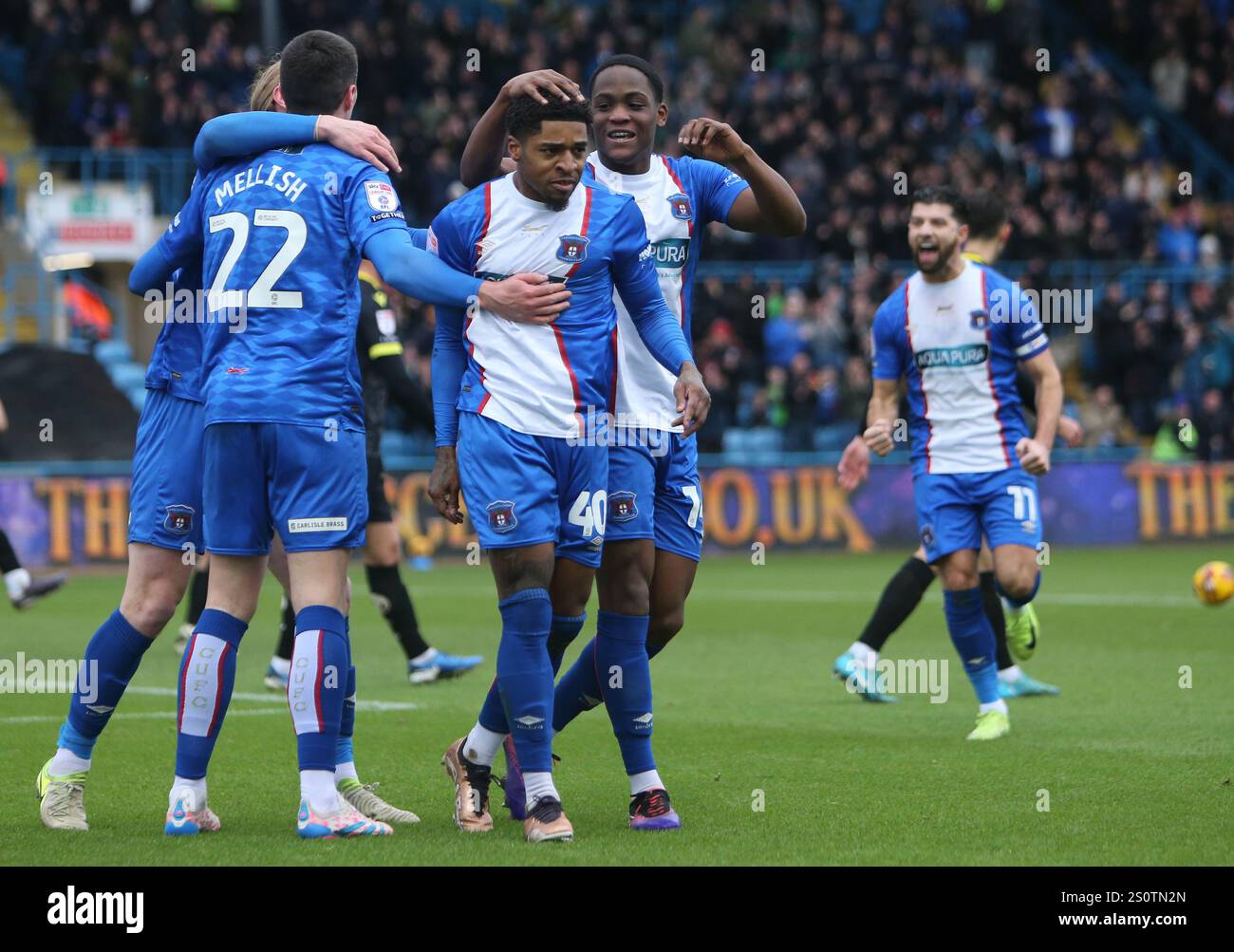 Carlisle, UK. 29th Dec 2024. Carlisle United players celebrate Carlisle ...