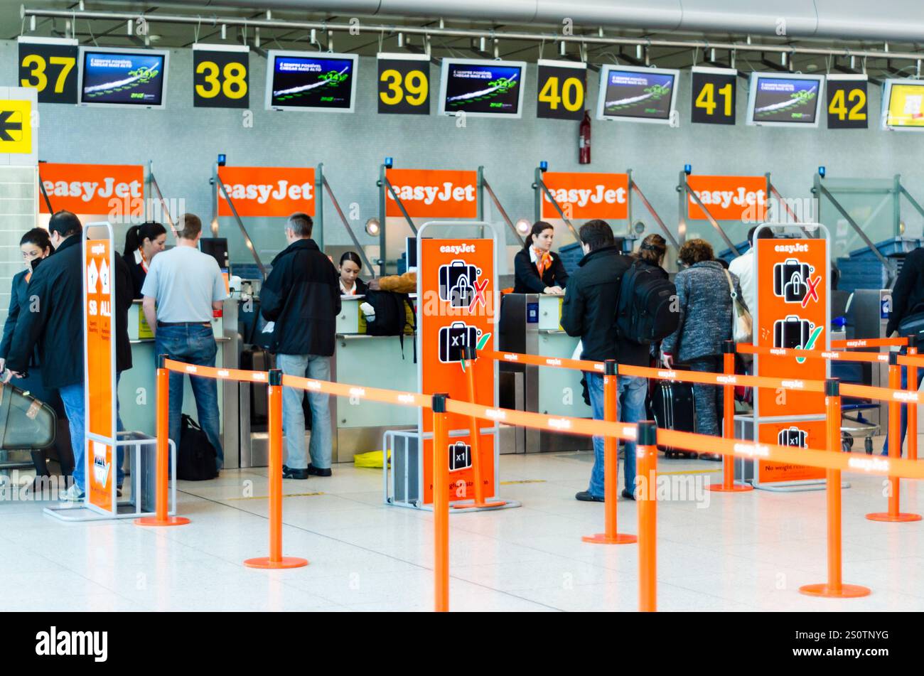 Vueling checkin rows Stock Photo - Alamy