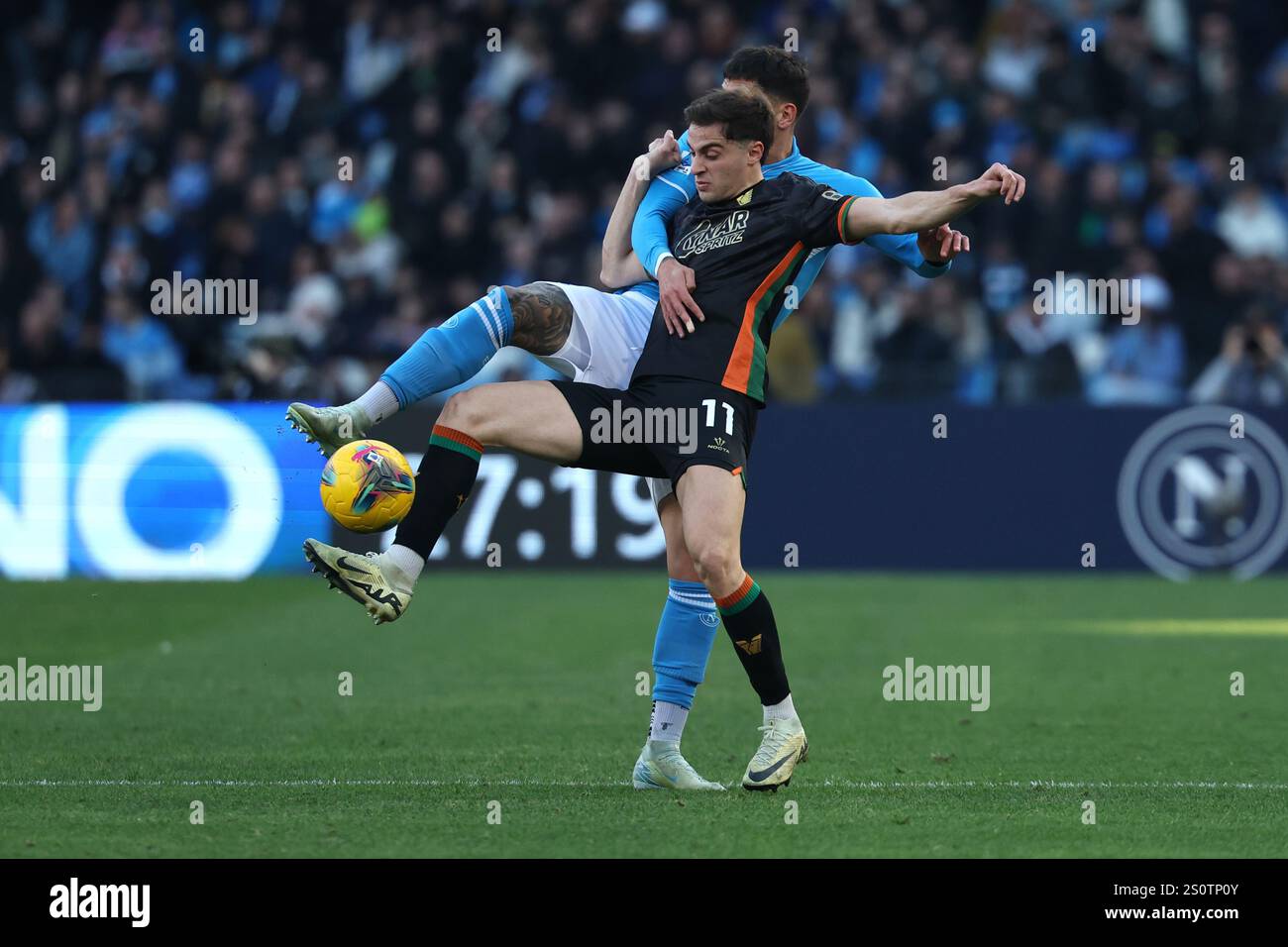 Napoli, Italia. 29th Dec, 2024. Napoli's Mathias Olivera, Venezia's ...