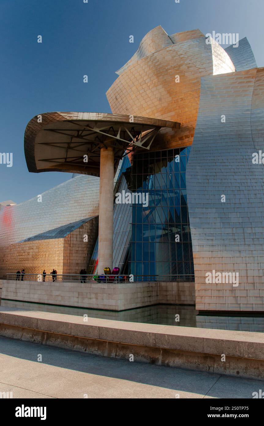 The Guggenheim Museum Bilbao, designed by the architect Frank Gehry, is ...