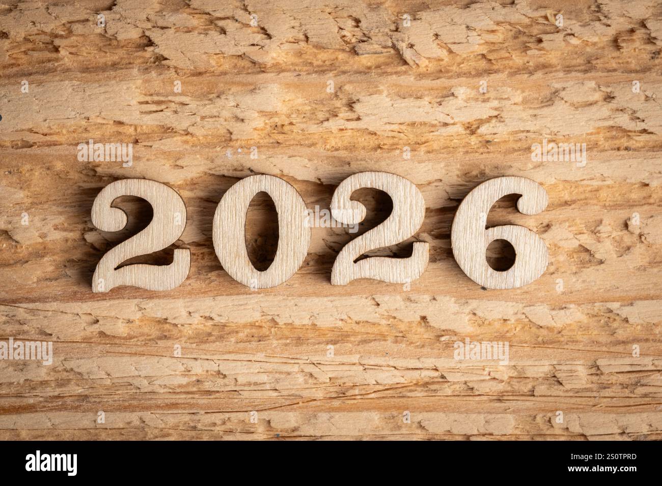 Wooden number 2026 on old wood background, Happy new year 2026 Stock Photo - Alamy