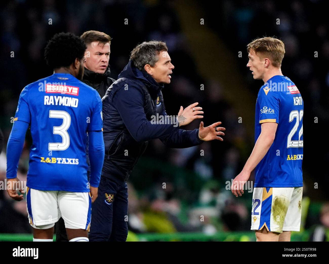 St Johnstone manager Simo Valakari (centre) speaks with Matt Smith ...