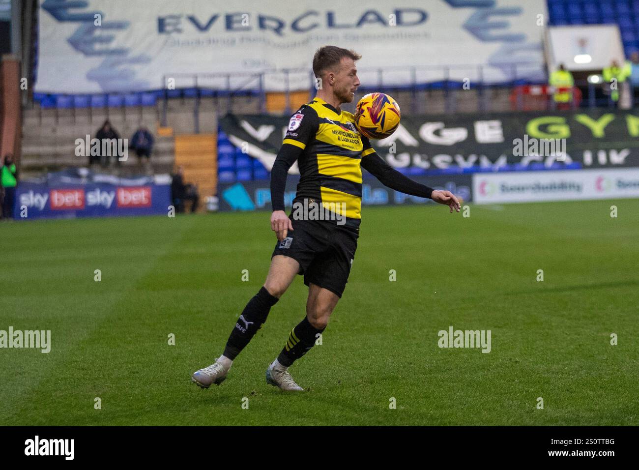 Birkenhead, UK. 29th Dec 2024. Elliot Christian Newby #11 of Barrow A.F ...