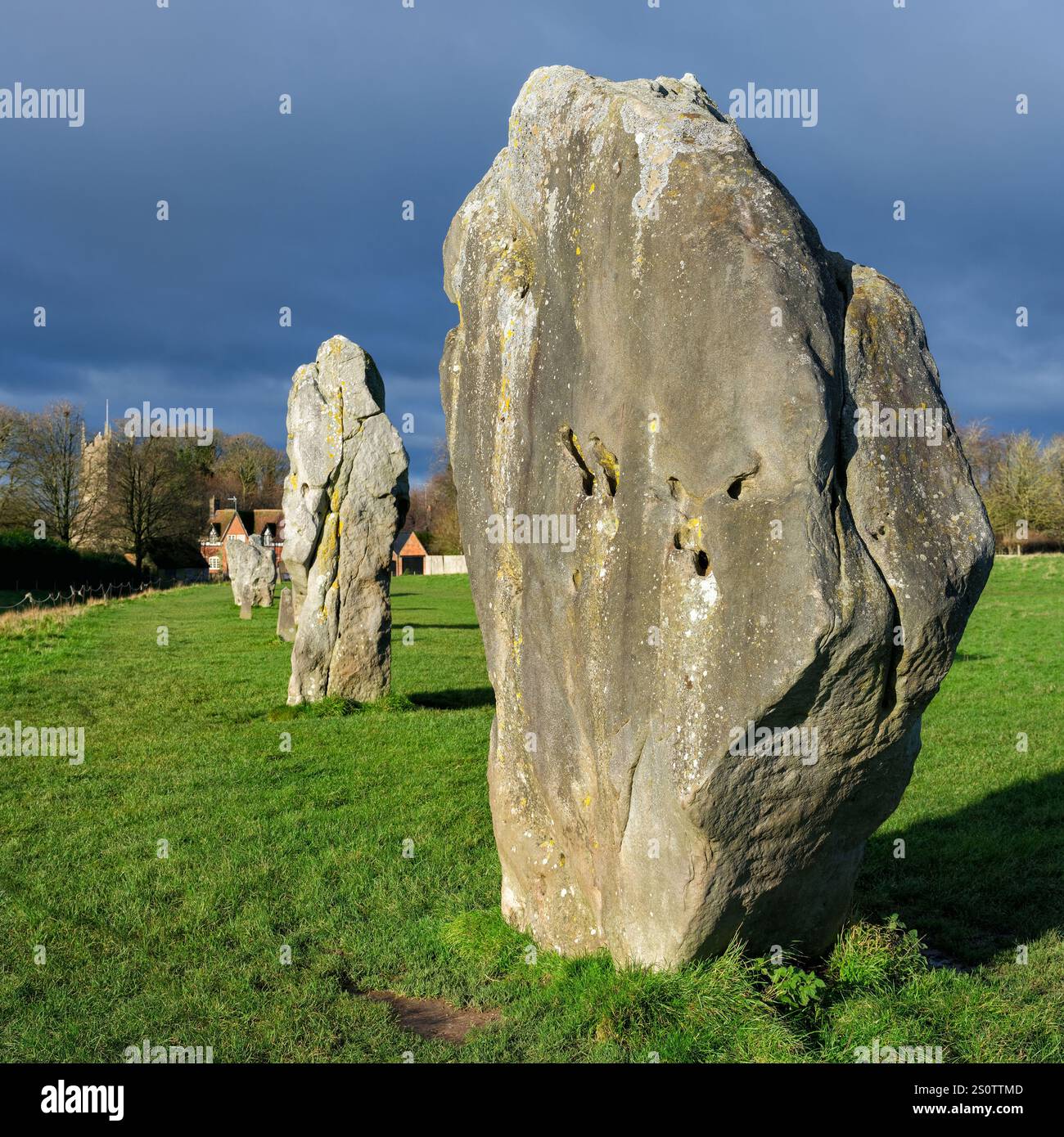 Sarsen standing stones of the outer ring of Avebury neolithic henge and ...