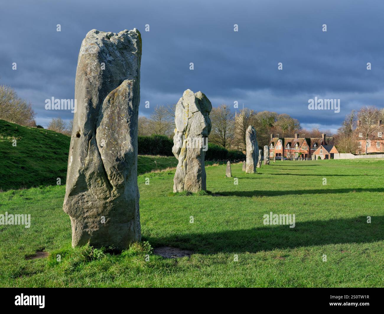 Standing sarsen stones of the outer ring of Avebury neolithic henge and ...