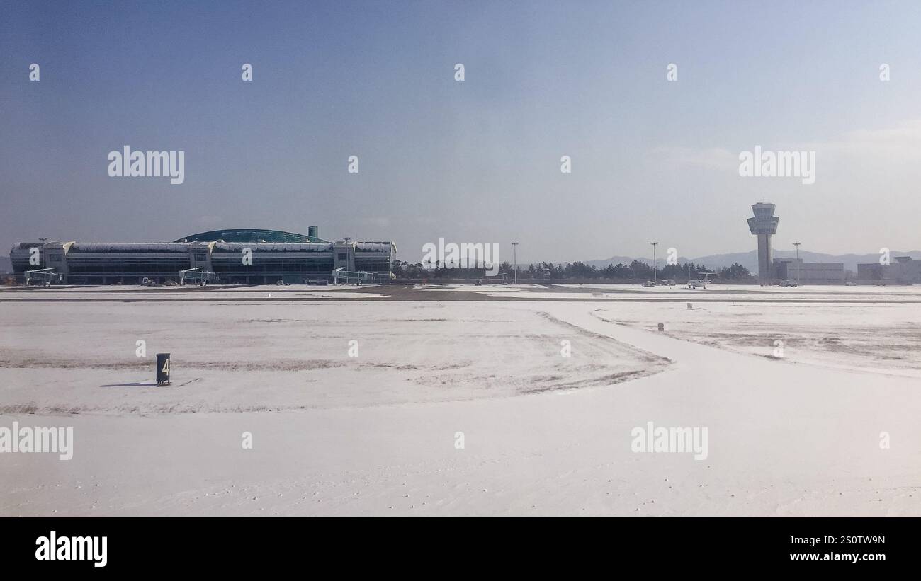runway, apron, terminal, control tower of Muan Airport, South Korea ...