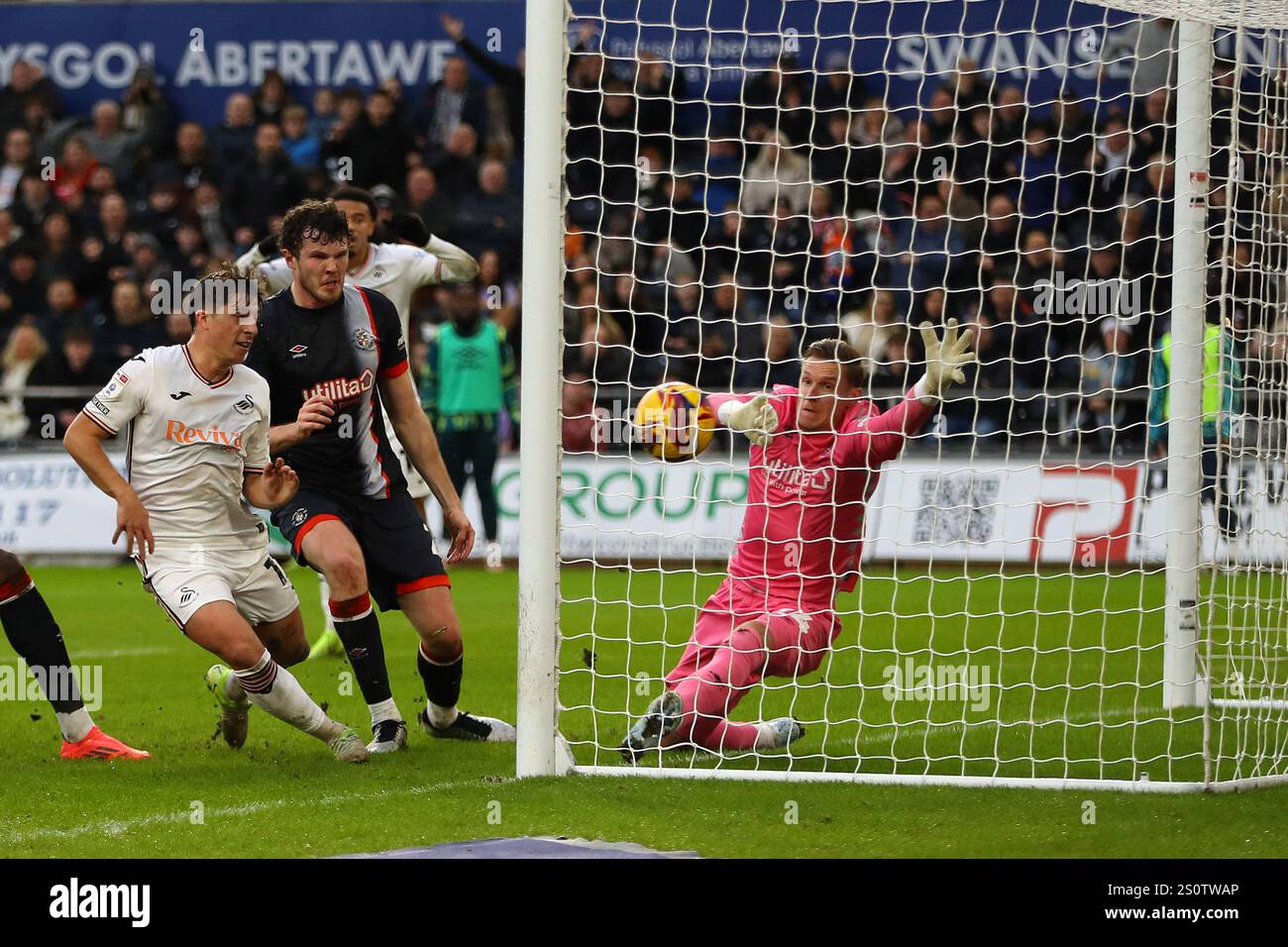 Swansea, UK. 29th Dec, 2024. Goncalo Franco of Swansea city scores his ...