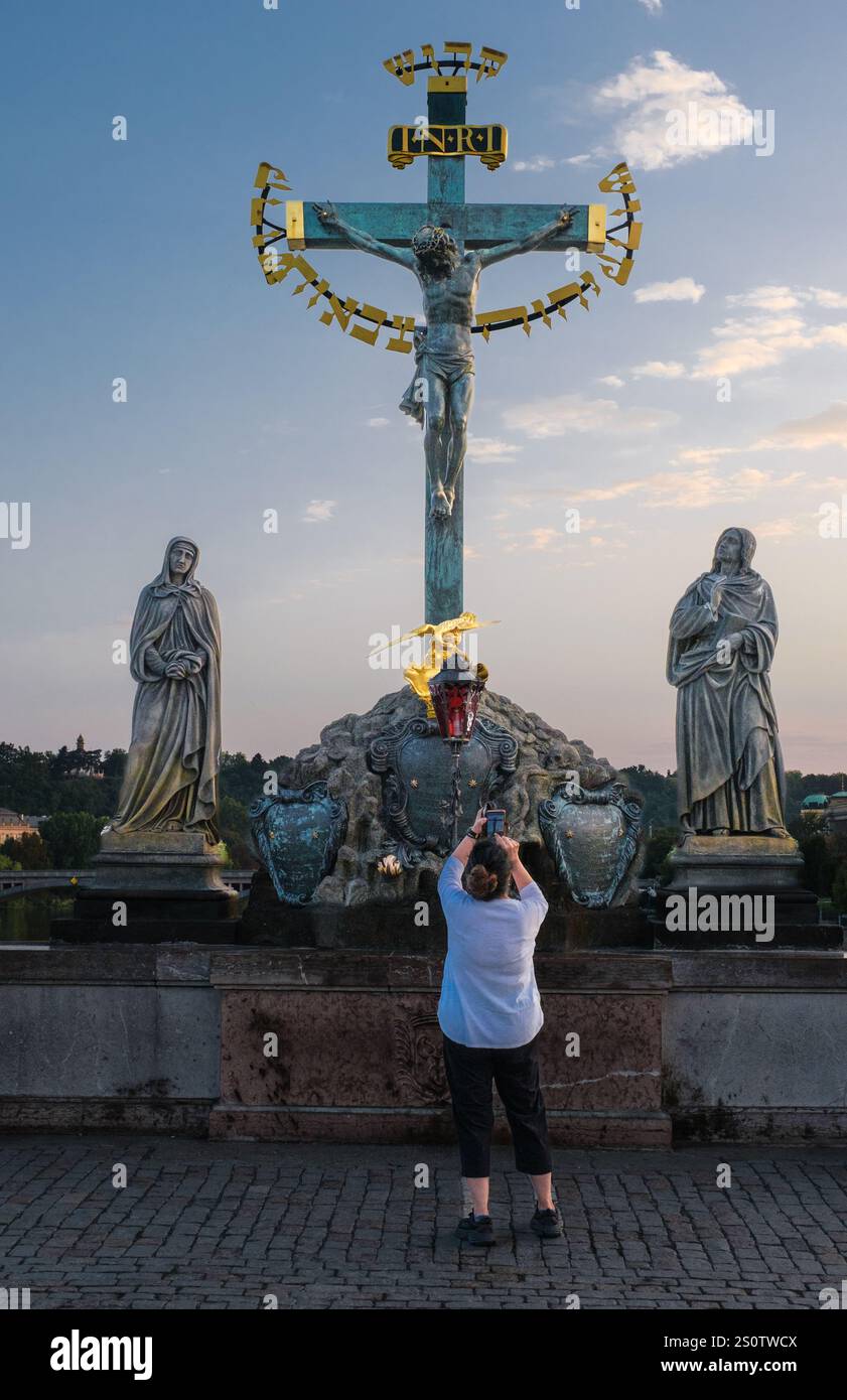 Charles Bridge, Tourist Photographing Christ on the Cross, Prague ...