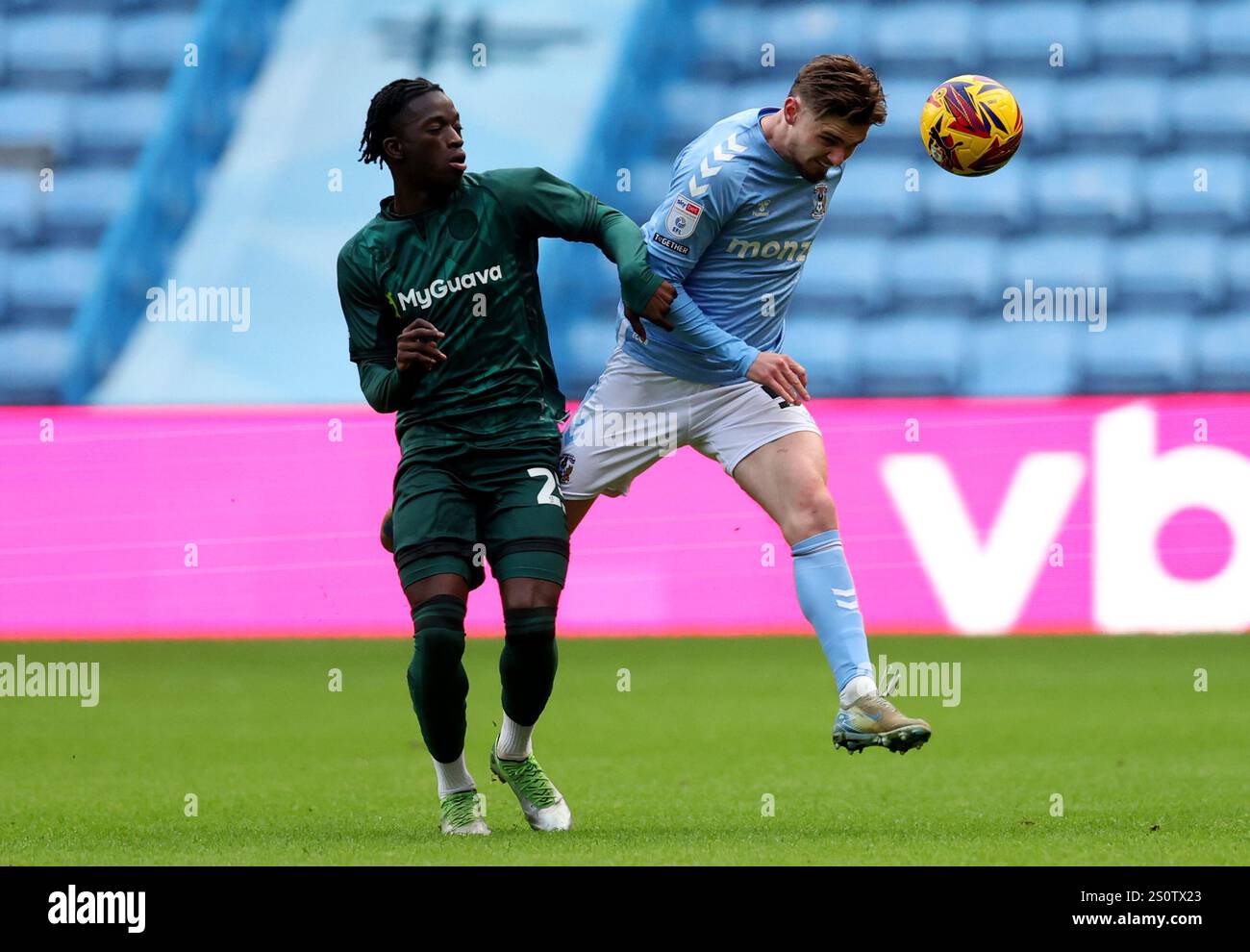 Coventry City's Jack Rudoni (right) and Millwall's Romain Esse (left ...