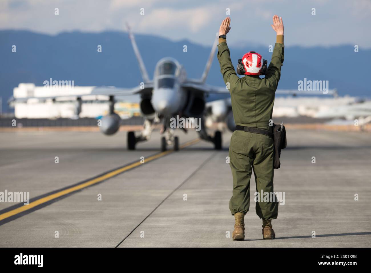 U.S. Marine Corps Lance Cpl. Christopher Fisher, an aircraft ordnance ...
