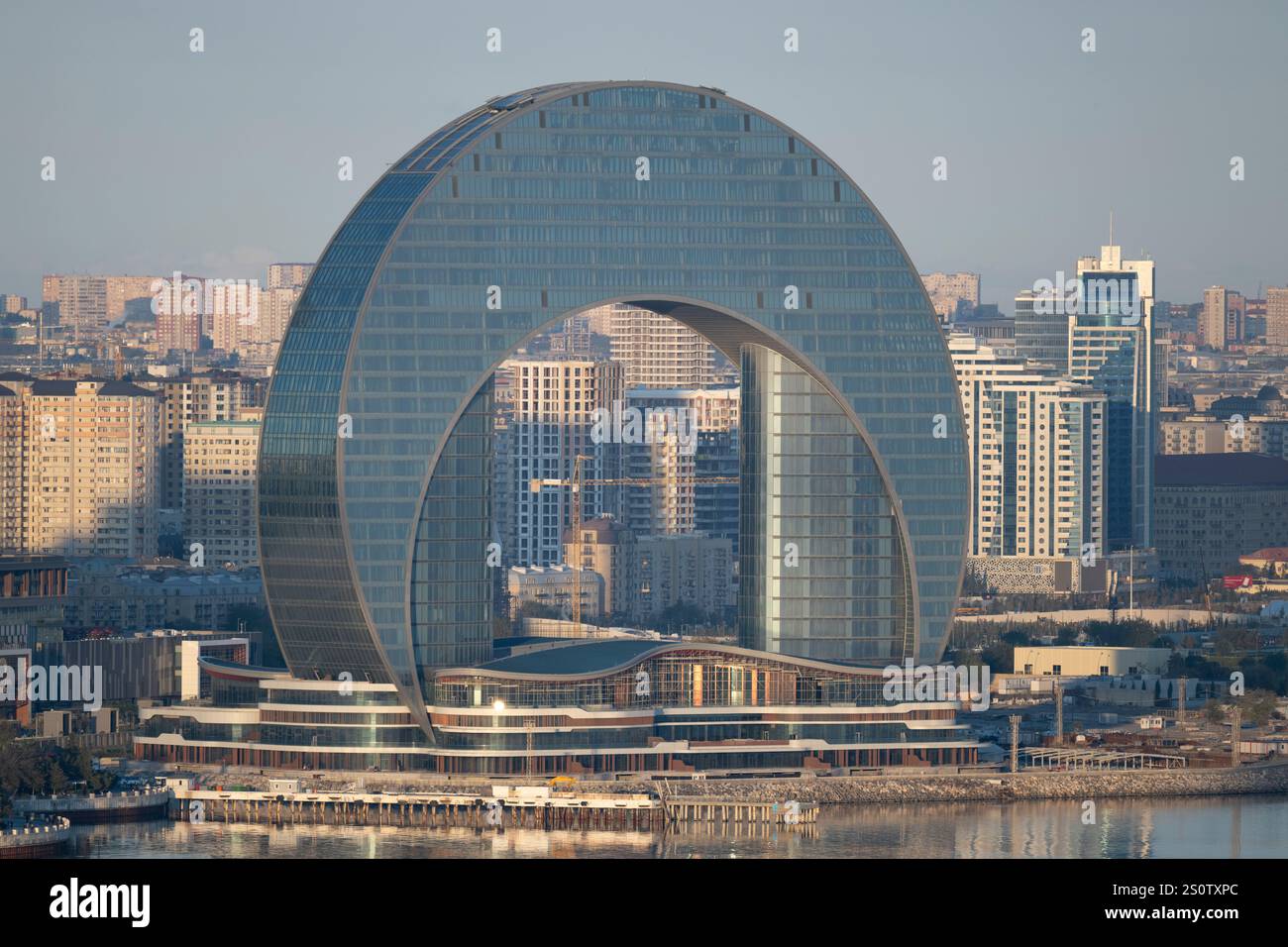 Baku, Azerbaijan. 27th Oct, 2024. A crescent-shaped hotel building on ...