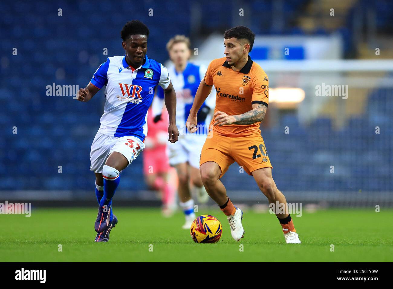 Hull City's Gustavo Puerta runs with the ball whilst under pressure ...