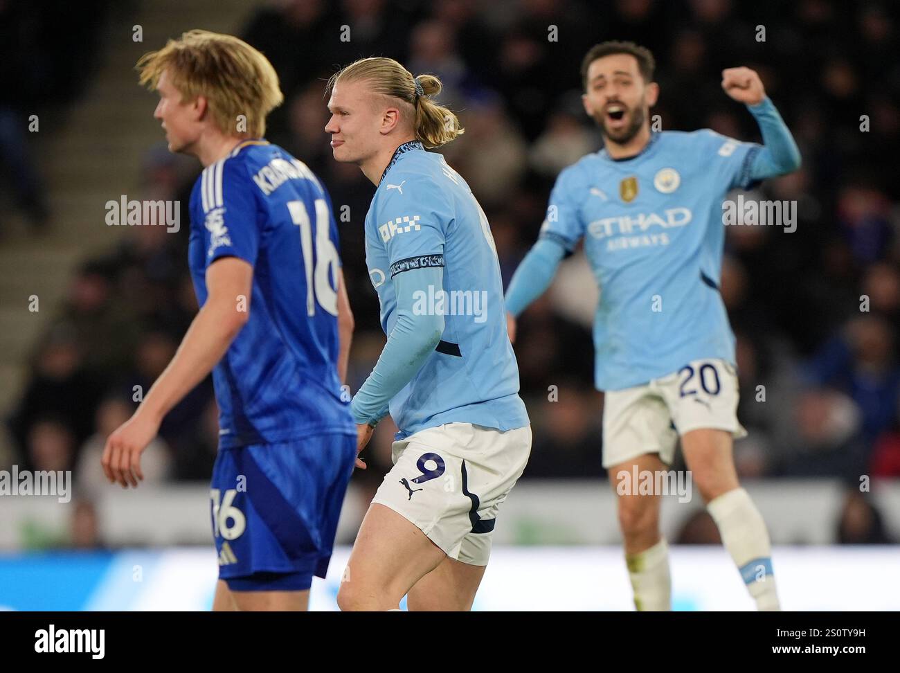 Manchester City's Erling Haaland (centre) celebrates scoring their side ...