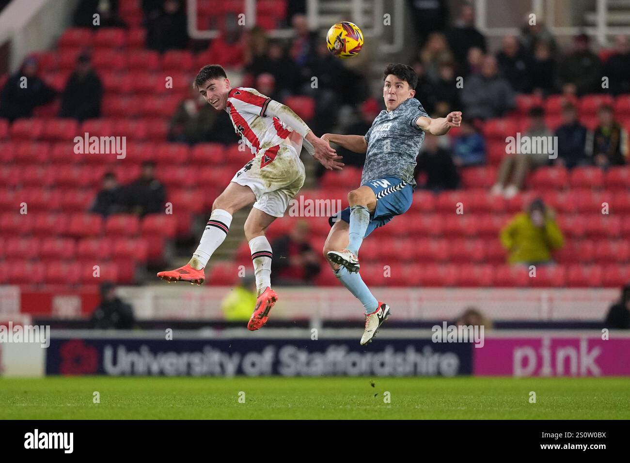 Stoke City's Andy Moran (left) and Sunderland's Luke O'Nien battle for ...