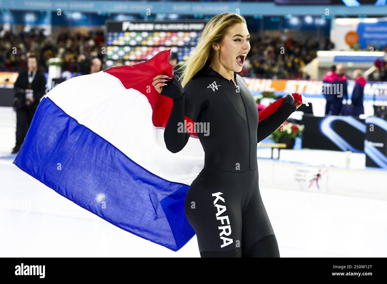HEERENVEEN - Jutte Leerdam cheers after winning the Dutch sprint speed ...