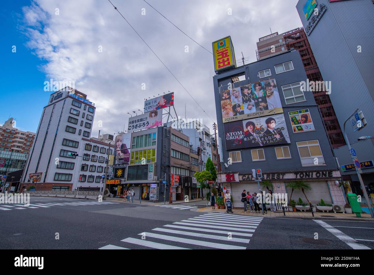 Modern commercial buildings on Sakai suji Avenue at Nipponbashi in ...