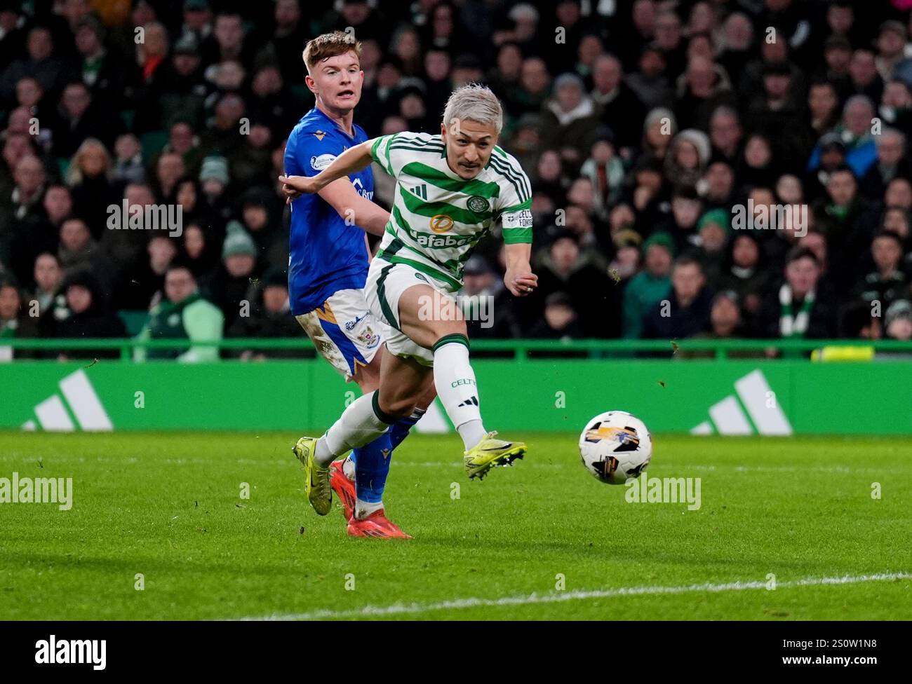 Celtic's Daizen Maeda (right) scores his sides fourth goal during the ...
