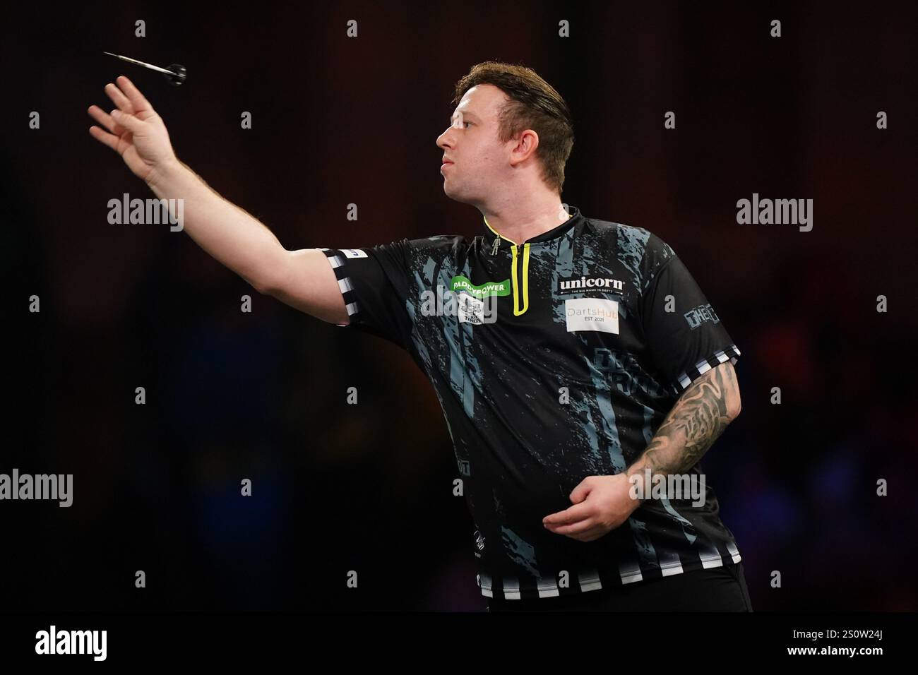 Callan Rydz in action during his third round match against Dimitri Van ...