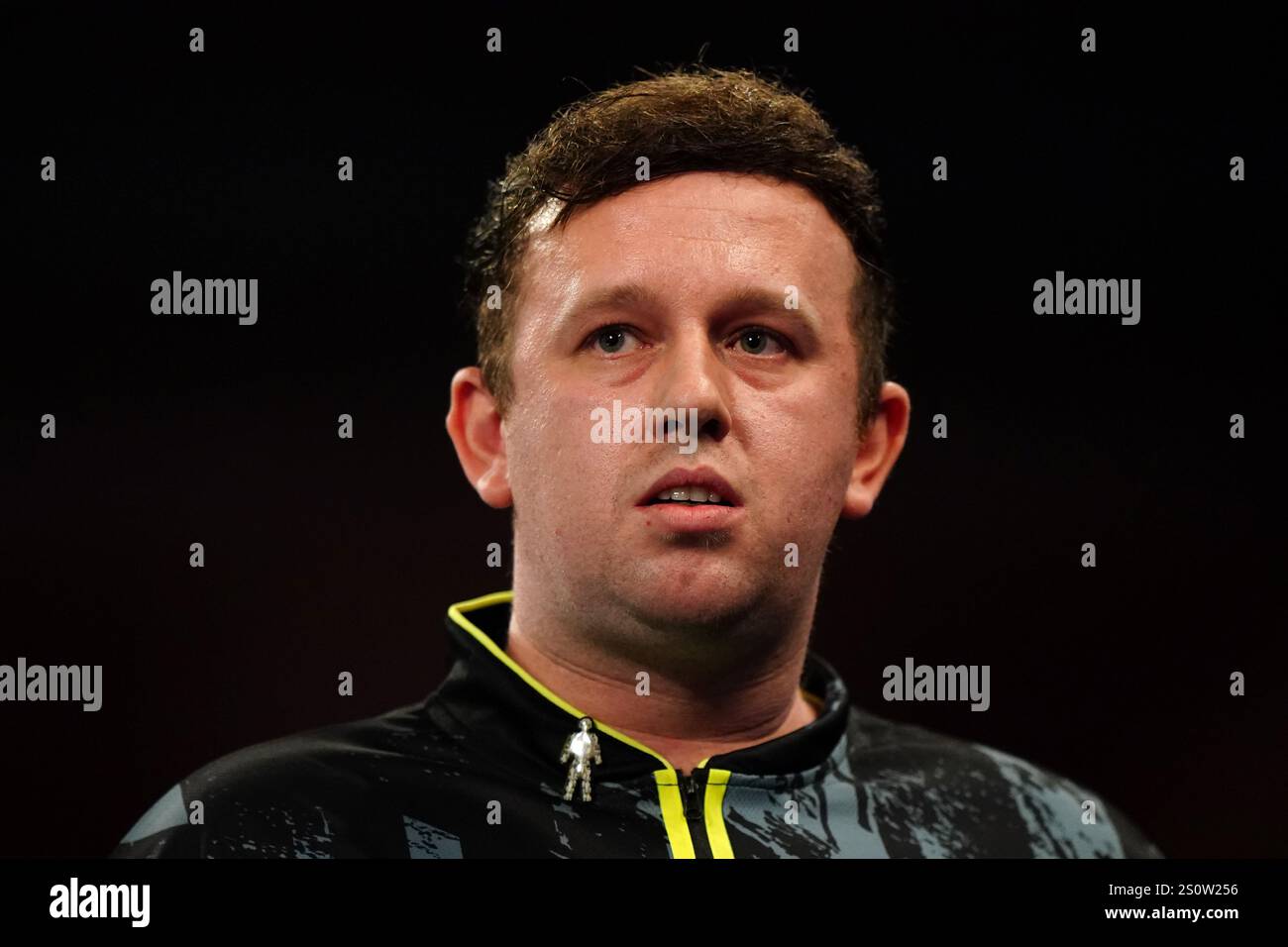 Callan Rydz in action during his third round match against Dimitri Van ...