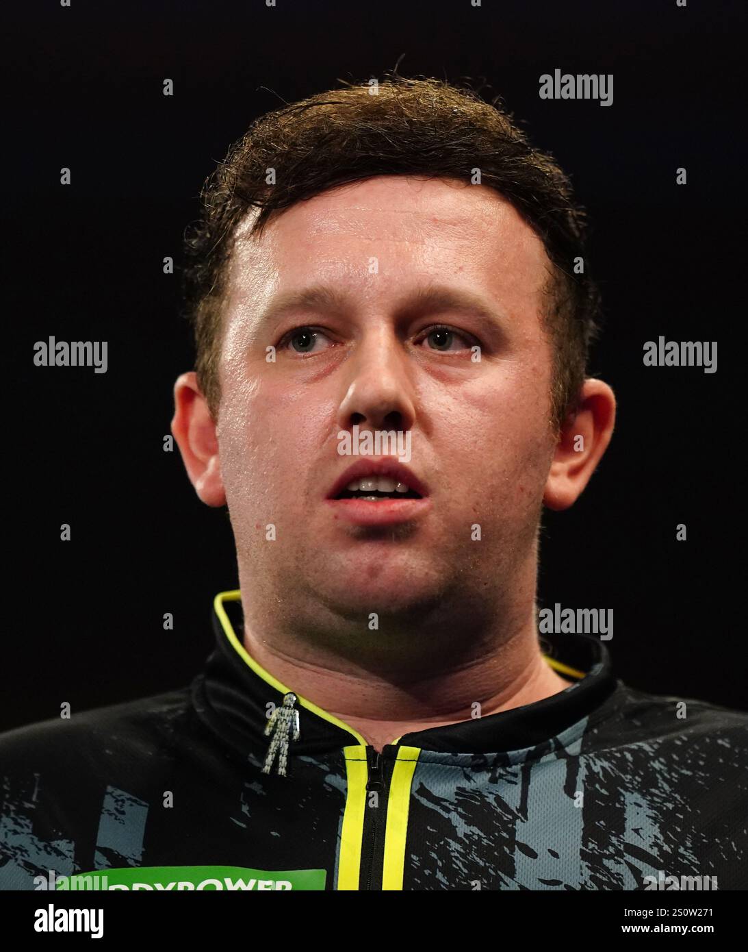 Callan Rydz in action during his third round match against Dimitri Van ...