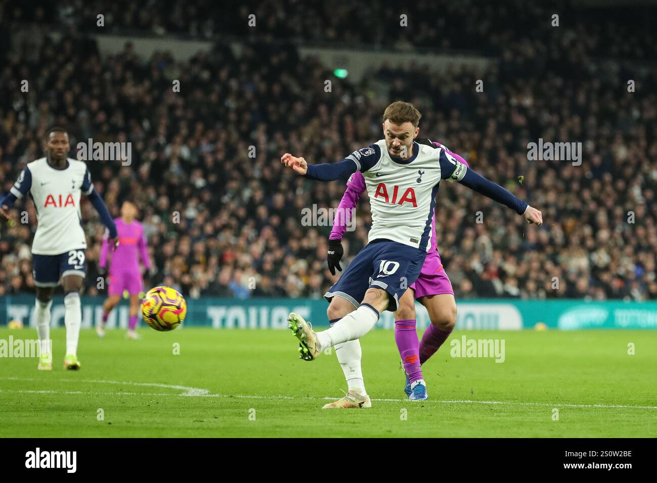 London, UK. 29th Dec, 2024. James Maddison of Tottenham Hotspur shoots ...