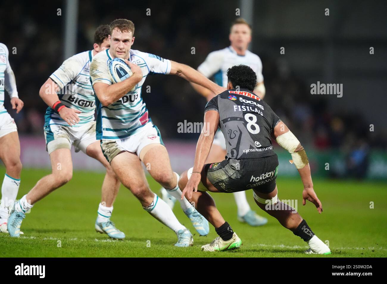 Gloucester's Max Llewellyn is tackled by Exeter's Greg Fisilau during ...
