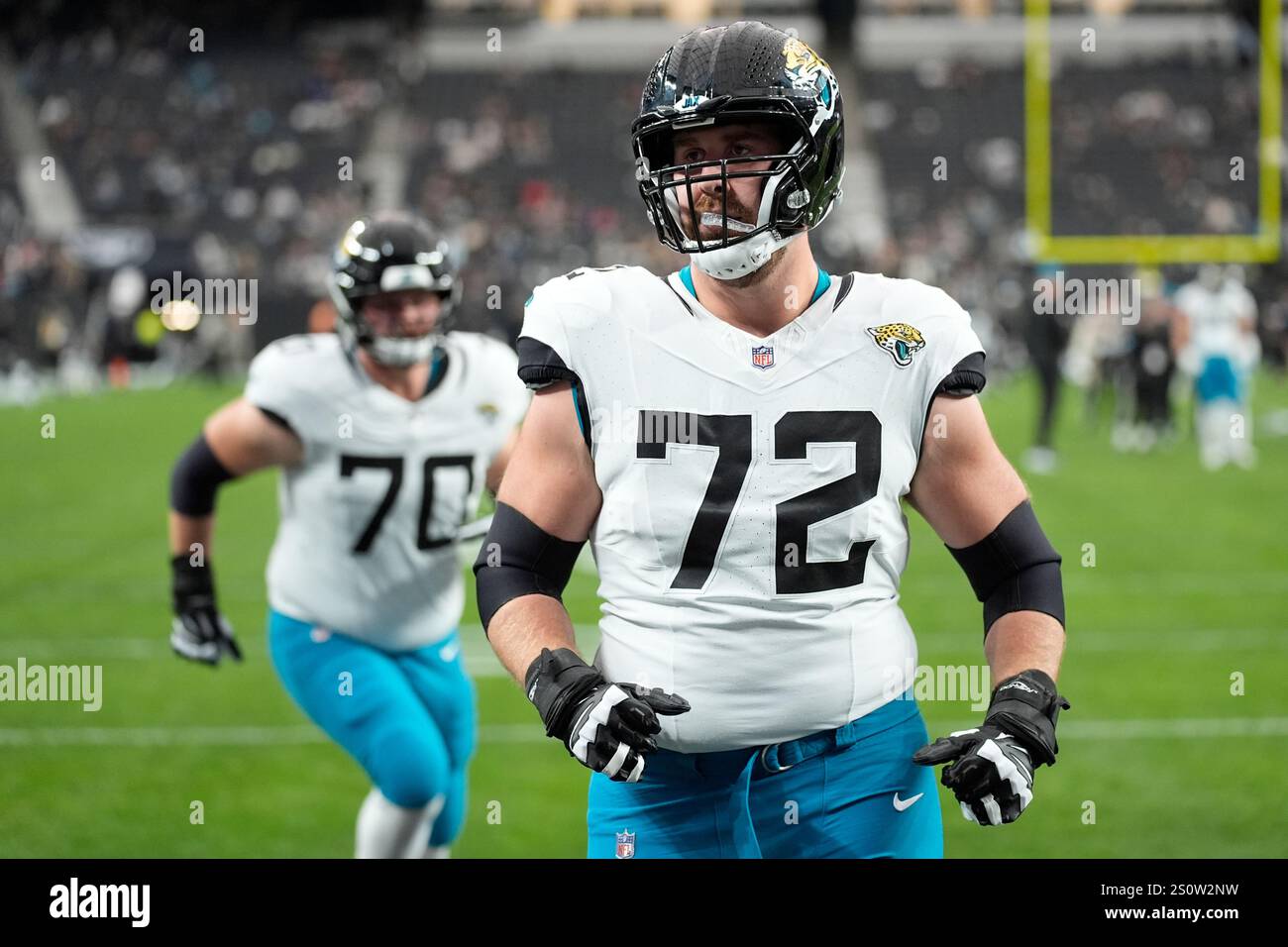 Jacksonville Jaguars offensive tackle Walker Little (72) warms up ...