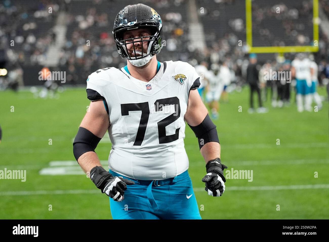 Jacksonville Jaguars offensive tackle Walker Little (72) warms up ...