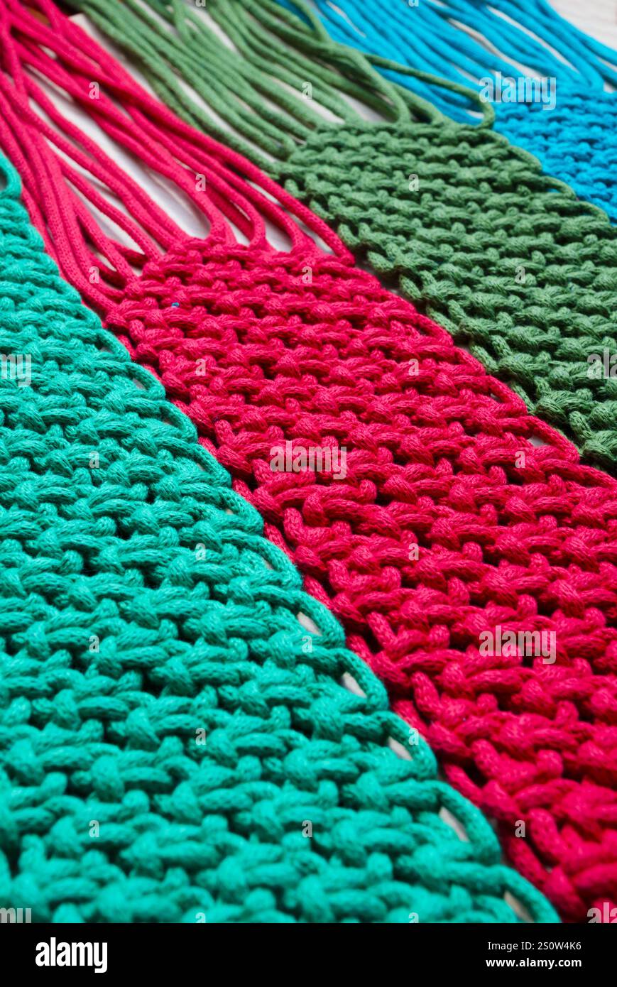 Macrame technique, a square knot of multi-colored threads. Colored ...