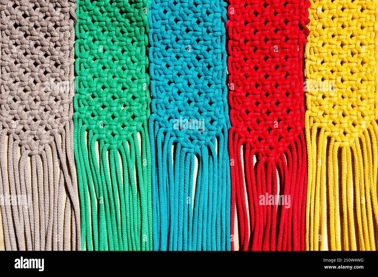 Macrame technique, a square knot of multi-colored threads. Colored ...