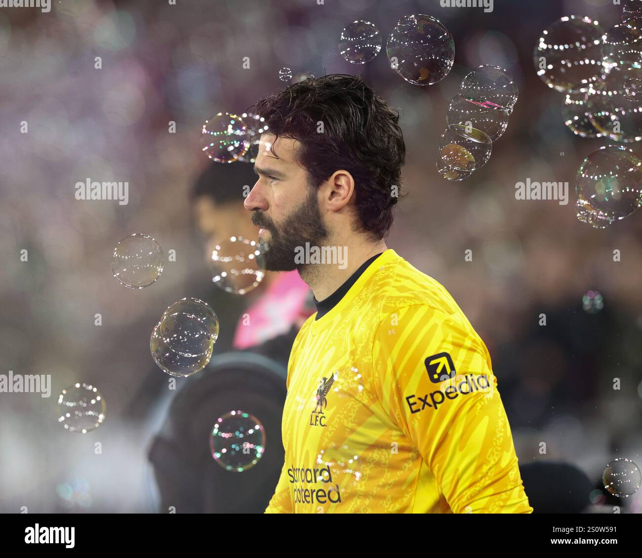 Alisson Becker of Liverpool out for kick-off during the Premier League ...