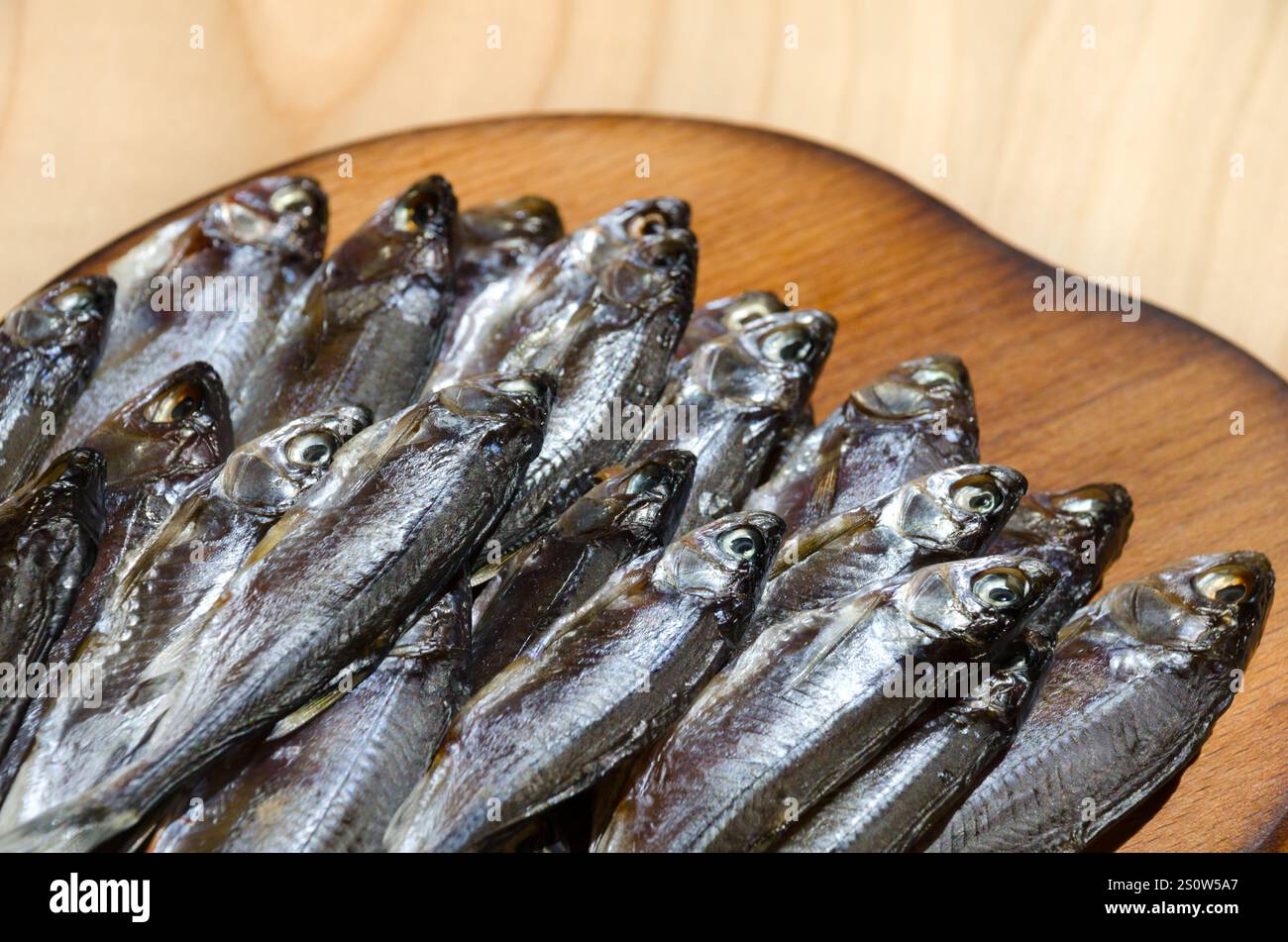 Bleak or Shemaya. Dried fish on a ceramic plate. Very tasty, fat top ...