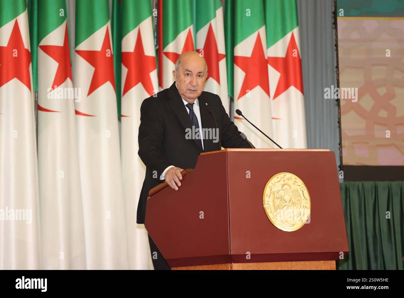 Algerian President Abdelmadjid Tebboune delivers a speech addressed to ...