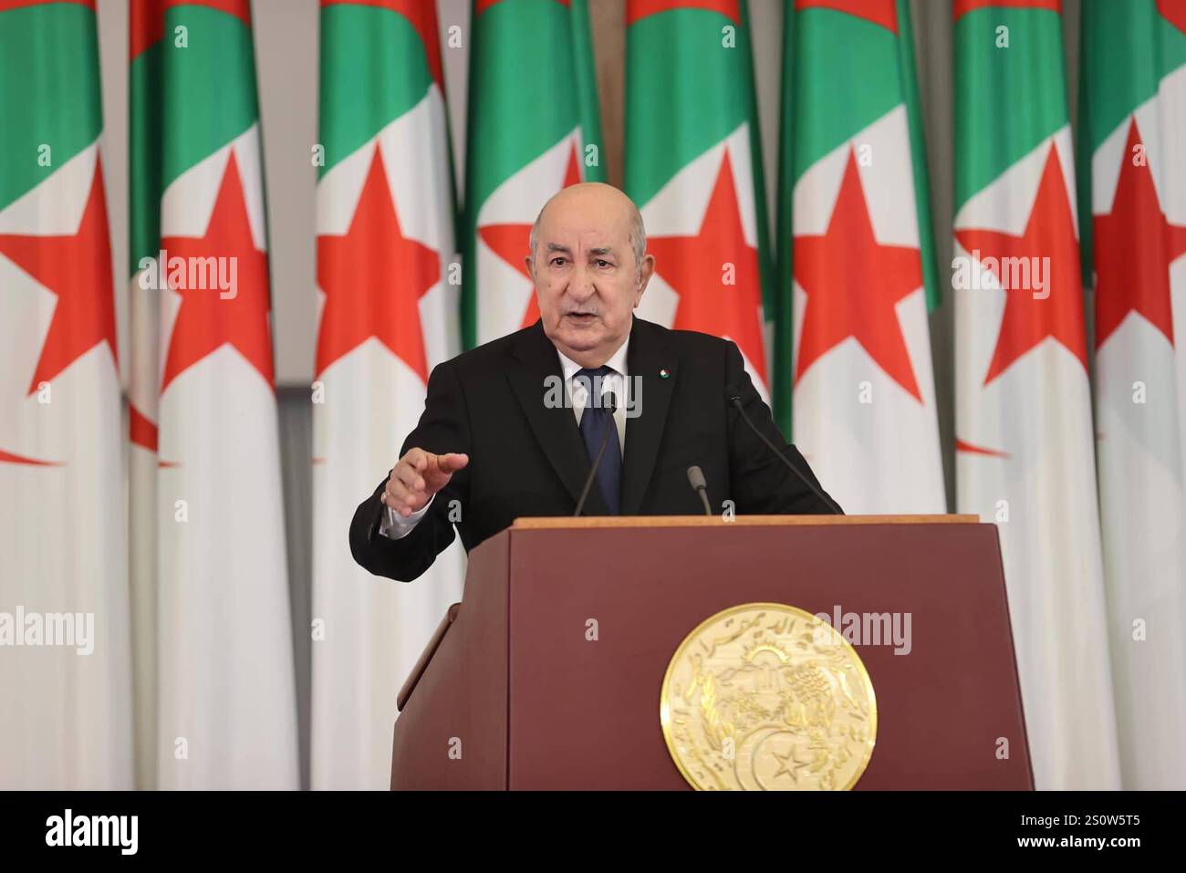 Algerian President Abdelmadjid Tebboune delivers a speech addressed to ...