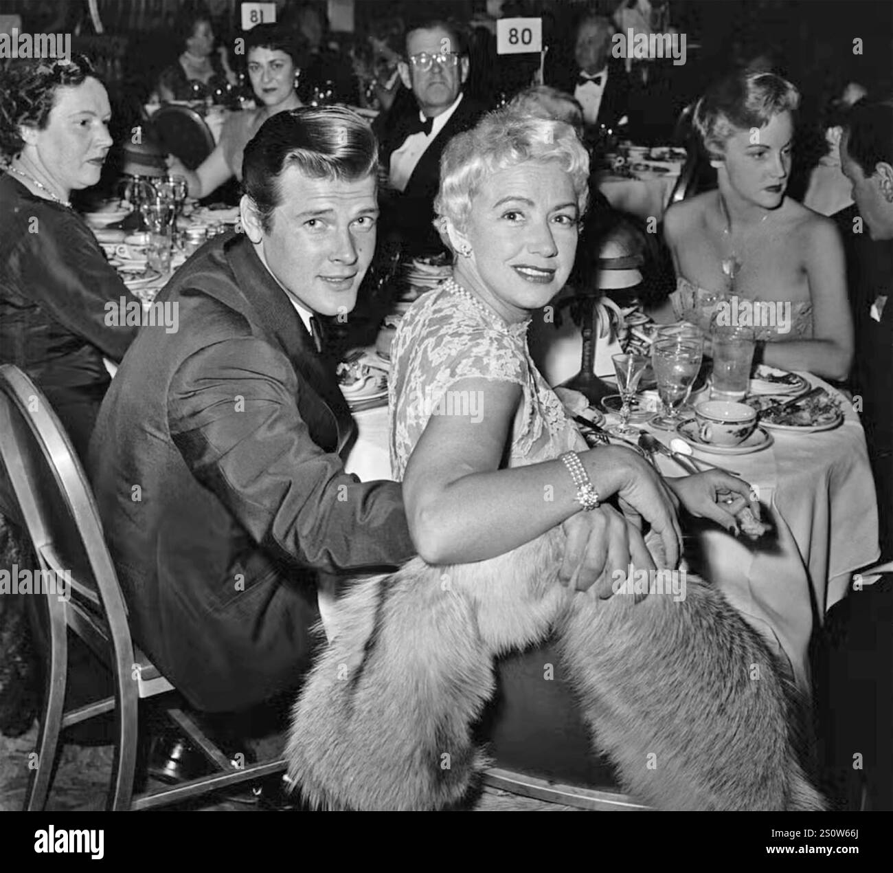 ROGER MOORE with his second wife, Dorothy Squires in Hollywood in 1955 ...