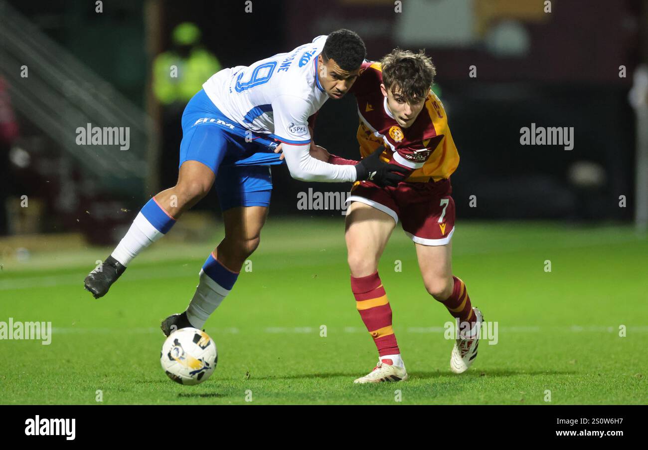 Motherwell's Tom Sparrow holds of Rangers' Danilo during the William ...