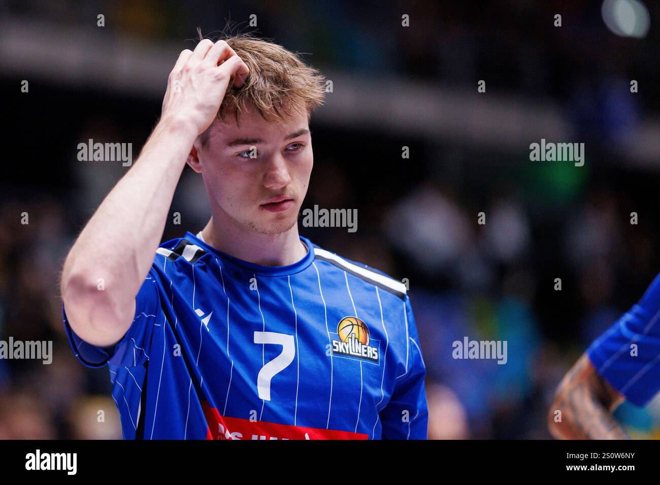 Frankfurt, Deutschland. 29th Dec, 2024. Timo Lanm?ller (Frankfurt Skyliners #7) kratzt sich am ...