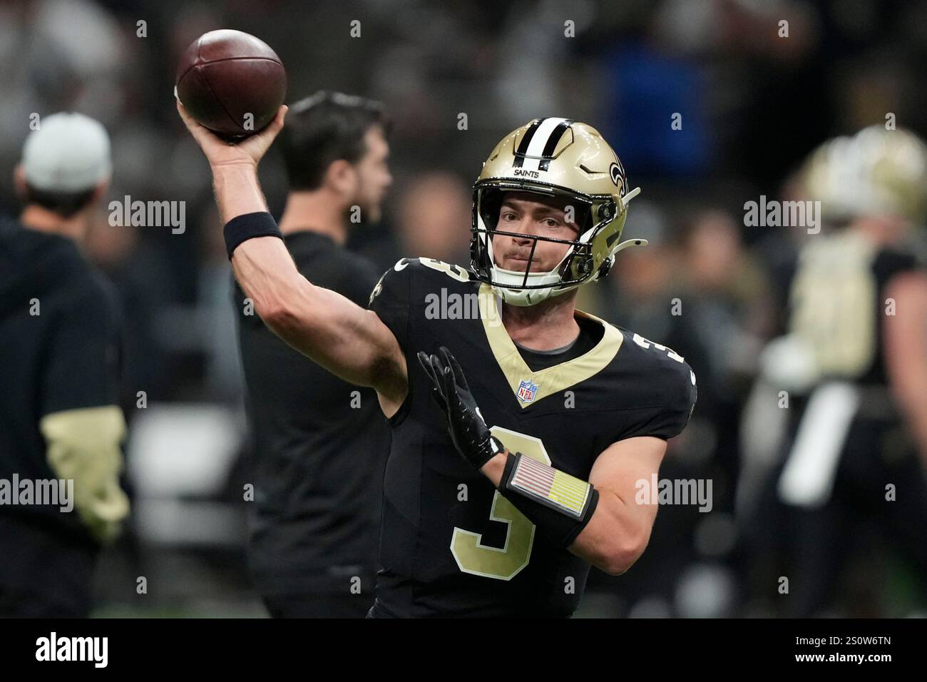 New Orleans Saints quarterback Jake Haener warms up before an NFL ...