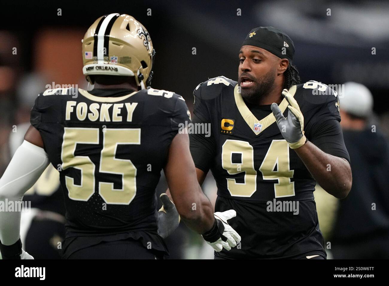 New Orleans Saints defensive end Cameron Jordan (94) talks with ...